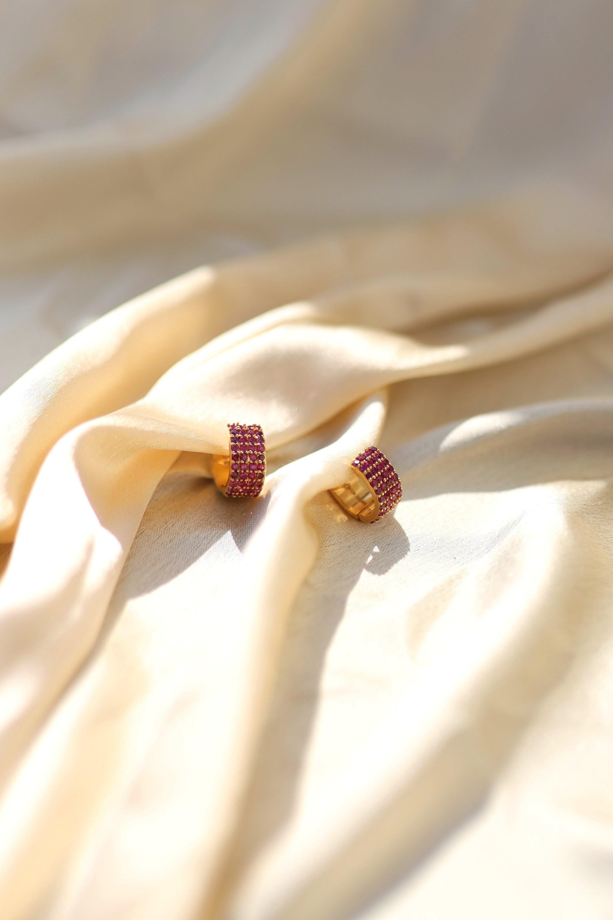 Radiant Pink Studded Huggies: Bestselling Jewelry for Chic Glamour